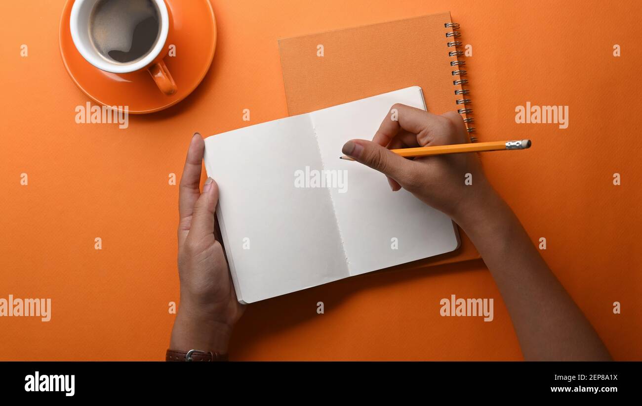 Overhead shot female writing hi-res stock photography and images - Alamy