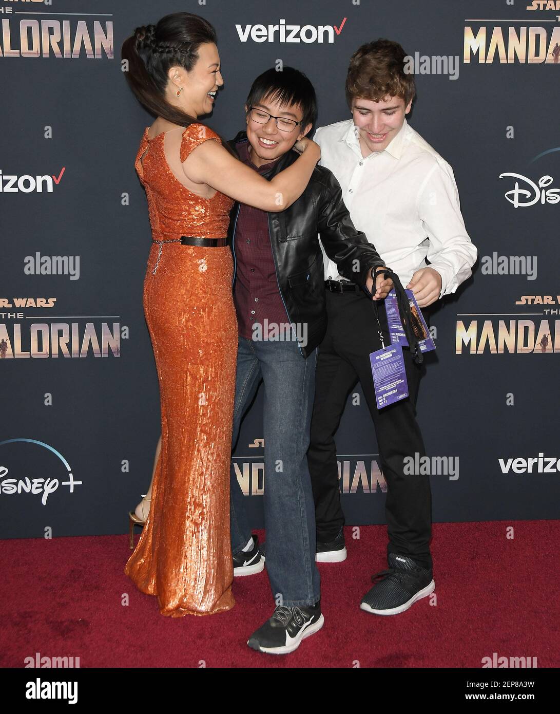 (L-R) Ming-Na Wen, Son Cooper Dominic Zee and Guest at the Disney+'s ...