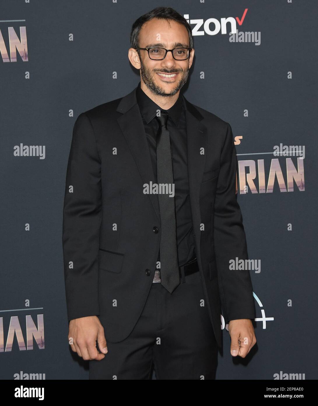 Omid Abtahi arrives at the Disney+'s THE MANDALORIAN Premiere held at ...