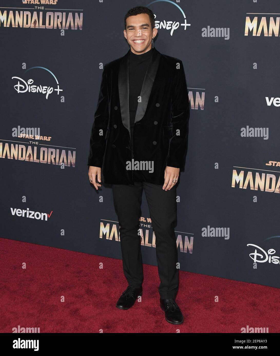 Adam Faison arrives at the Disney+'s THE MANDALORIAN Premiere held at ...