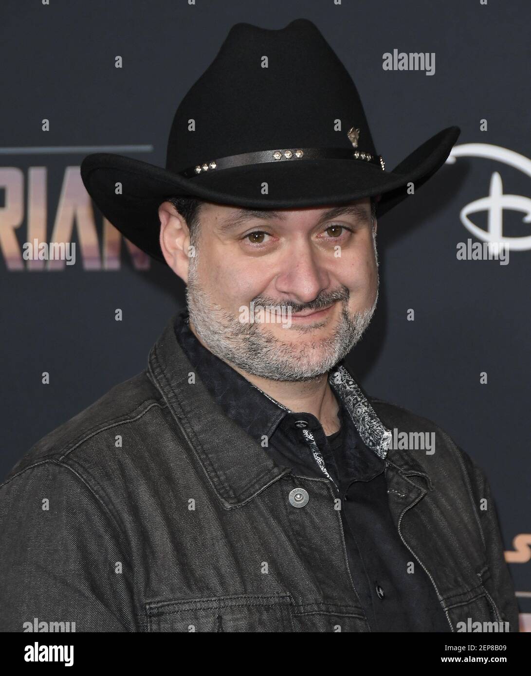 Dave Filoni arrives at the Disney+'s THE MANDALORIAN Premiere held at ...