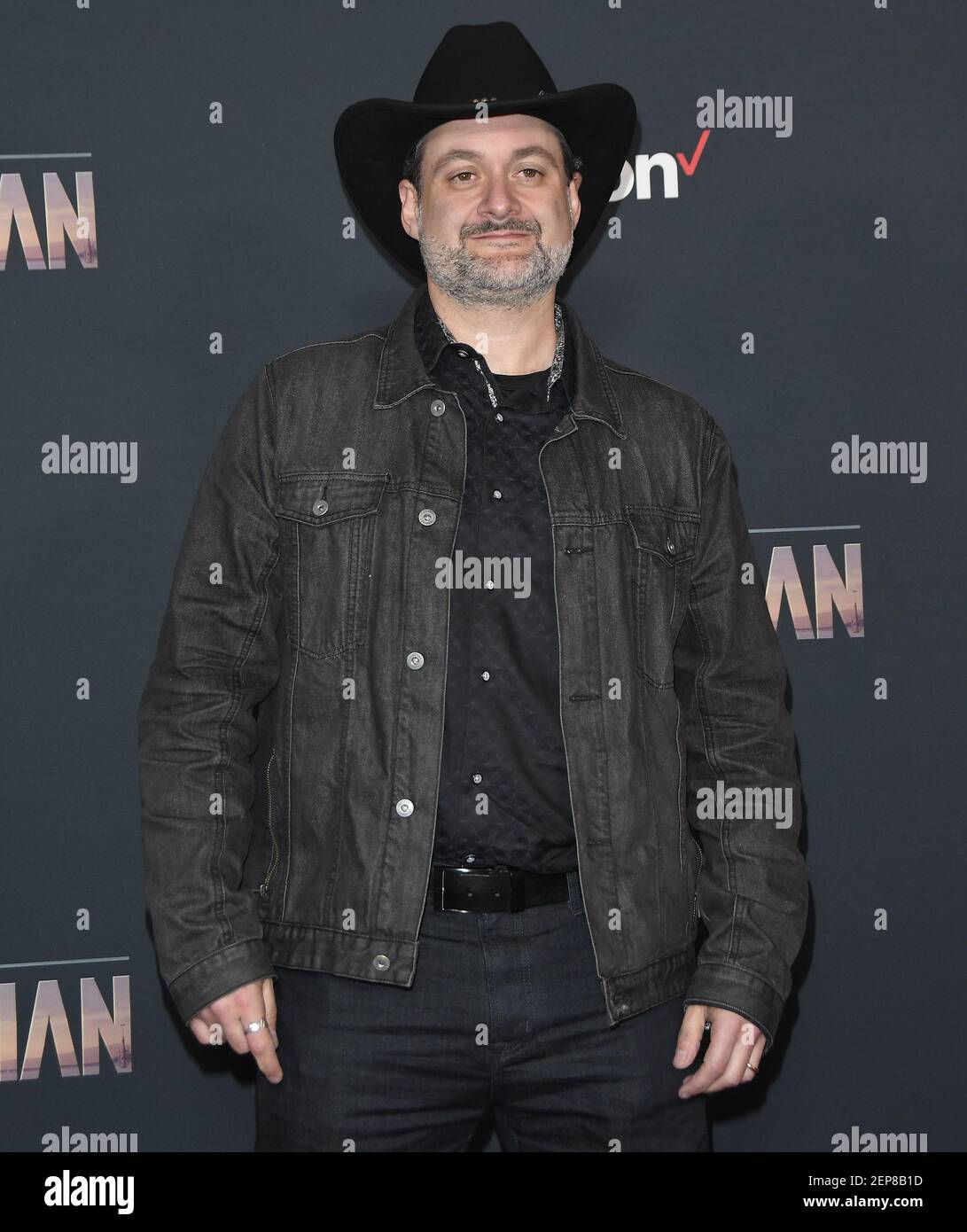 Dave Filoni arrives at the Disney+'s THE MANDALORIAN Premiere held at ...