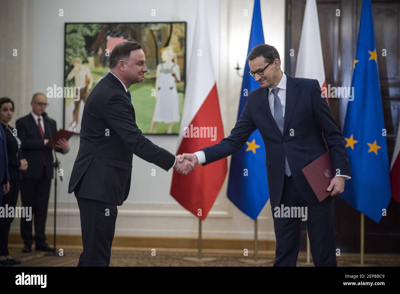 President Andrzej Duda and Prime Minister Mateusz Morawiecki shake ...