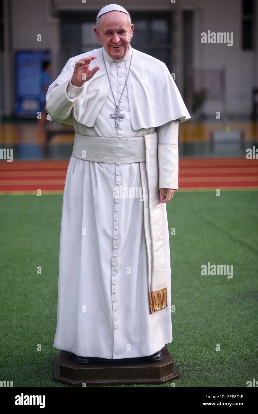 A life size statue of Pope Francis is displayed at the ground of Saint ...