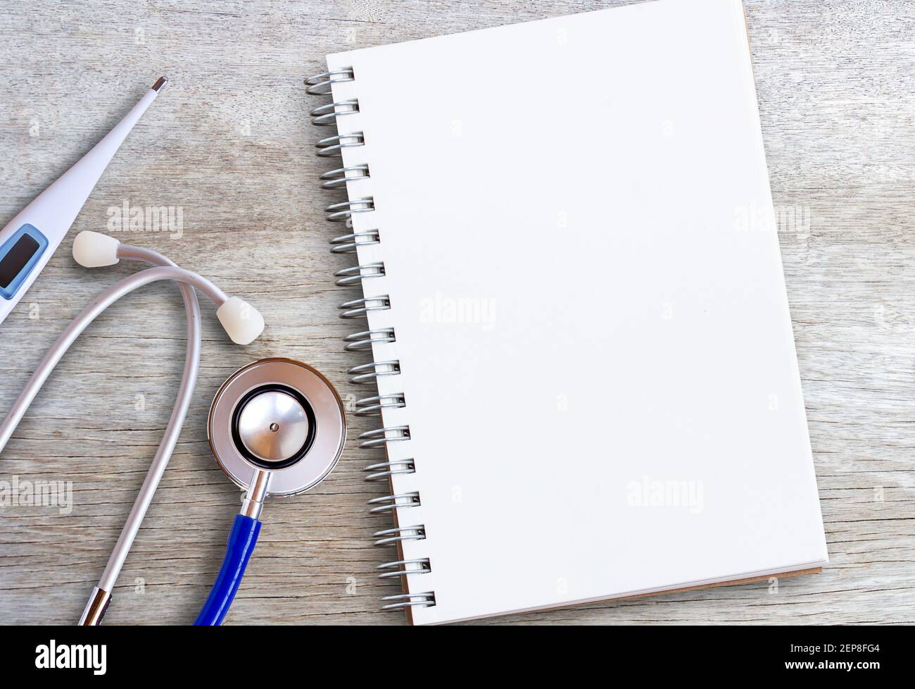 Medical healthy equipment.Blank notebooks or notepad,blue stethoscopes ...