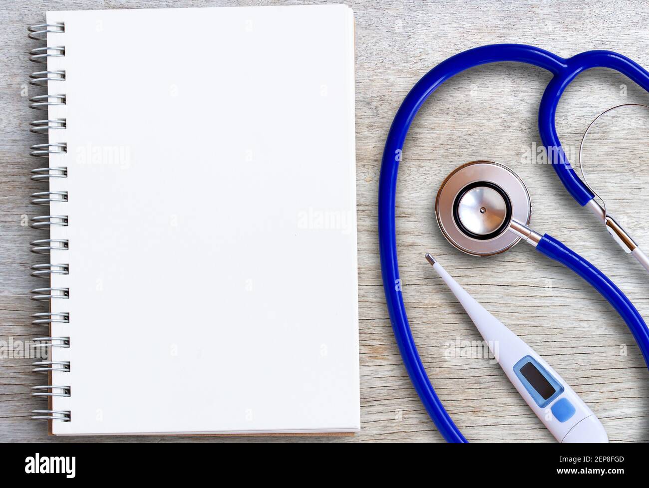 Medical healthy equipment.Blank notebooks or notepad,blue stethoscopes ...