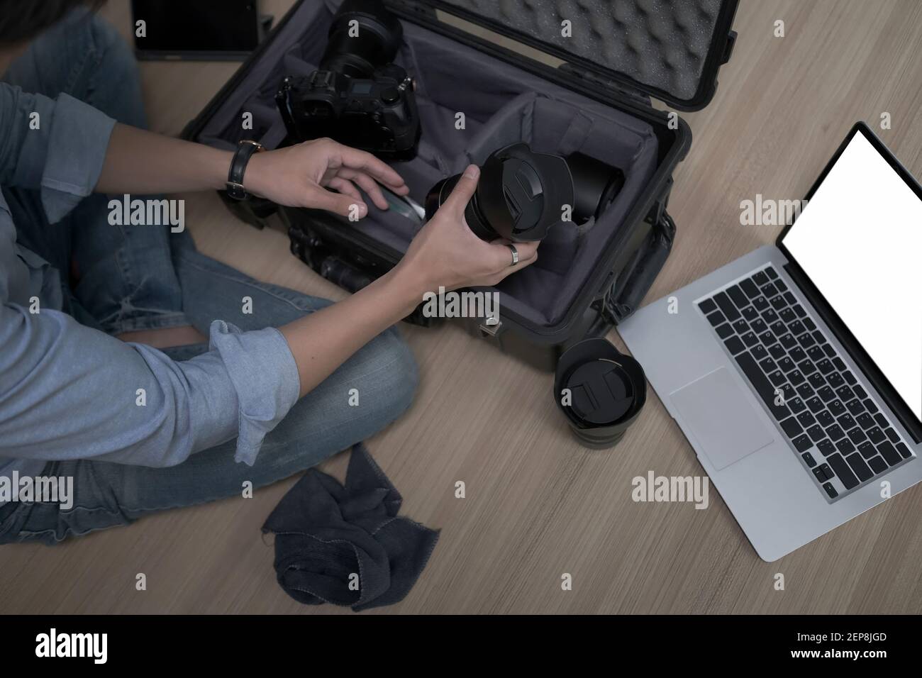 Male photographer putting camera hi-res stock photography and images ...