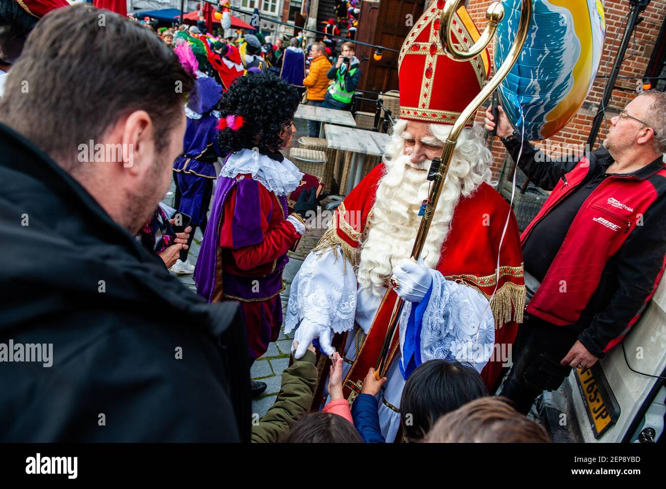 Sinterklaas greeting some children during the event. Like each year the ...