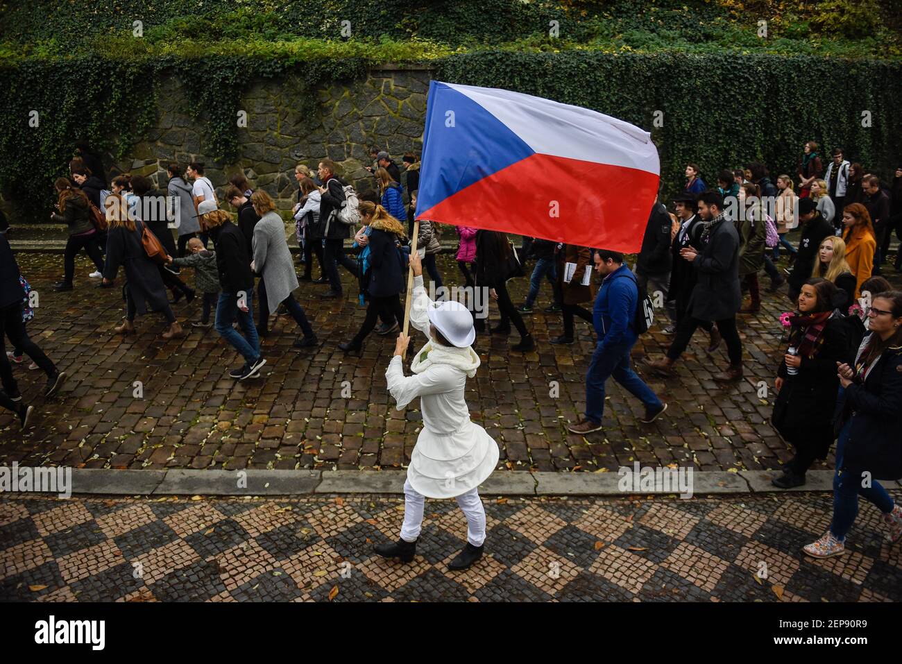 An actor holds a Czech Republic flag during the 30th anniversary of the ...