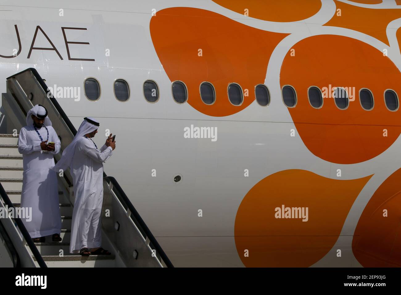 Visitors wearing a national arabic outfits are seen during the opening ...