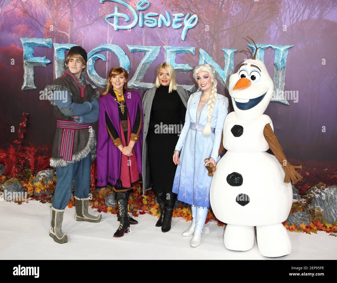 Holly Willoughby with characters from the film attend the "Frozen 2 ...