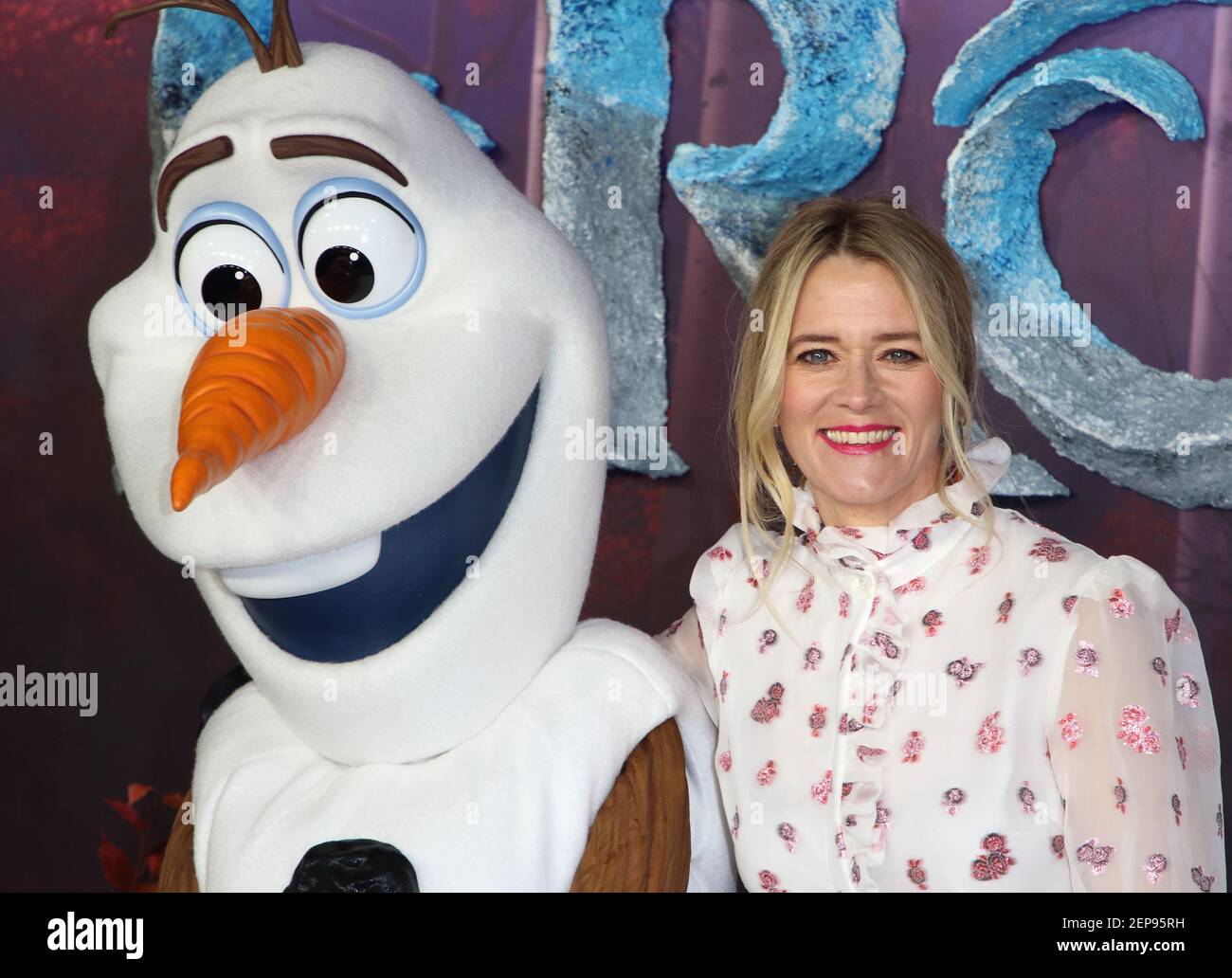 Olaf, a character from the film with Edith Bowman attend the "Frozen 2 ...
