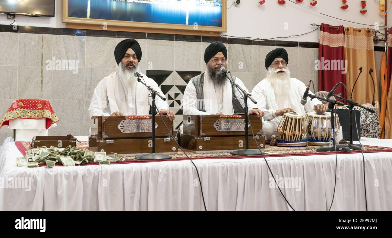 Musicians chant and play during 550th Birthday of Guru Nanak Dev Ji ...