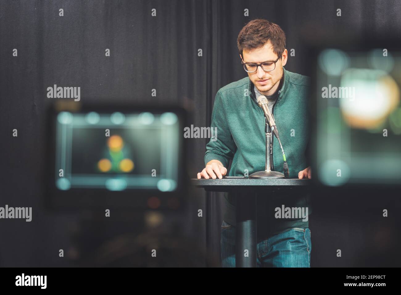 News anchor with microphone male hi-res stock photography and images ...