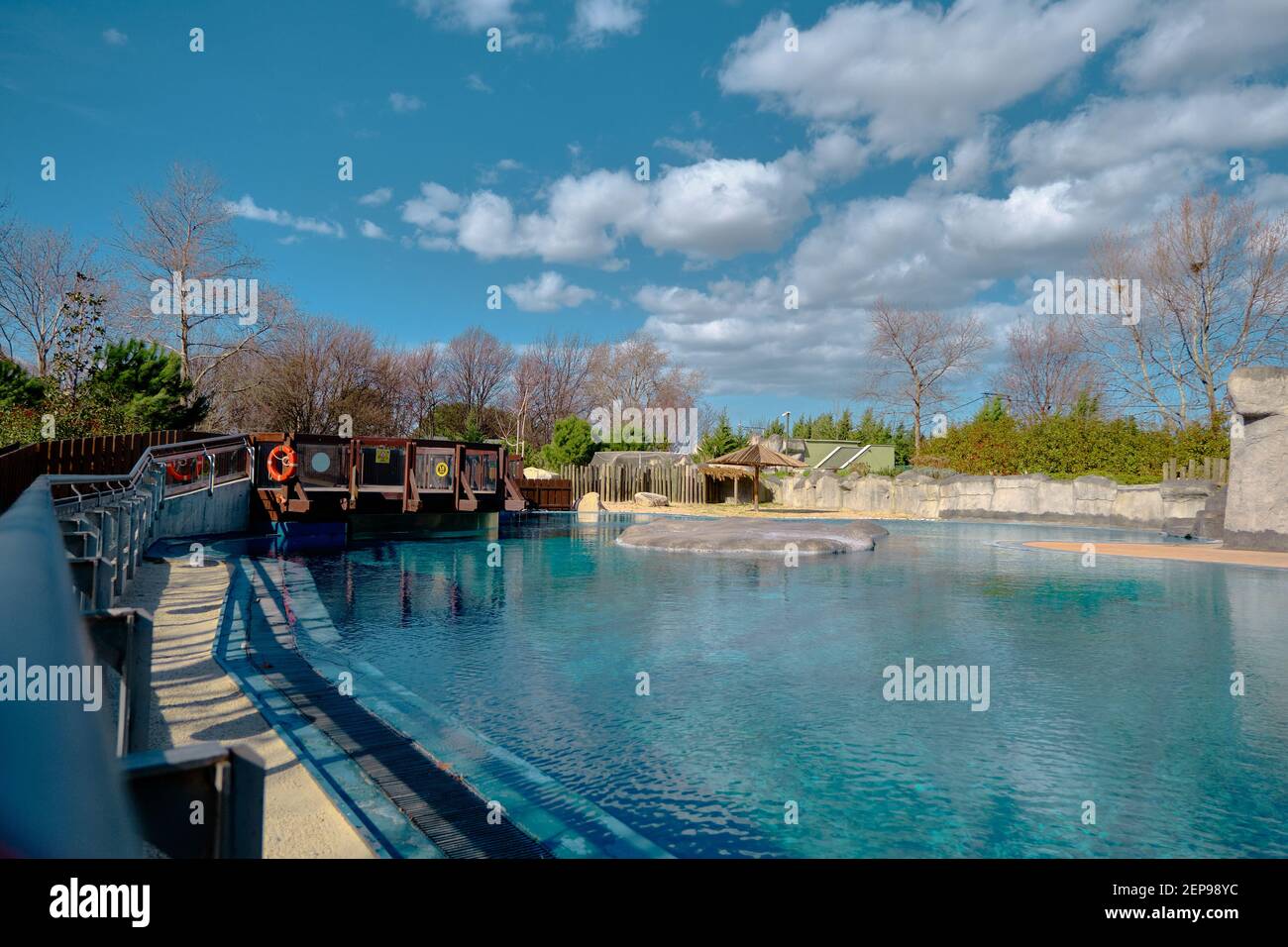 A blue swimming pool in a zoo for penguins and seals in Bursa, Turkey ...