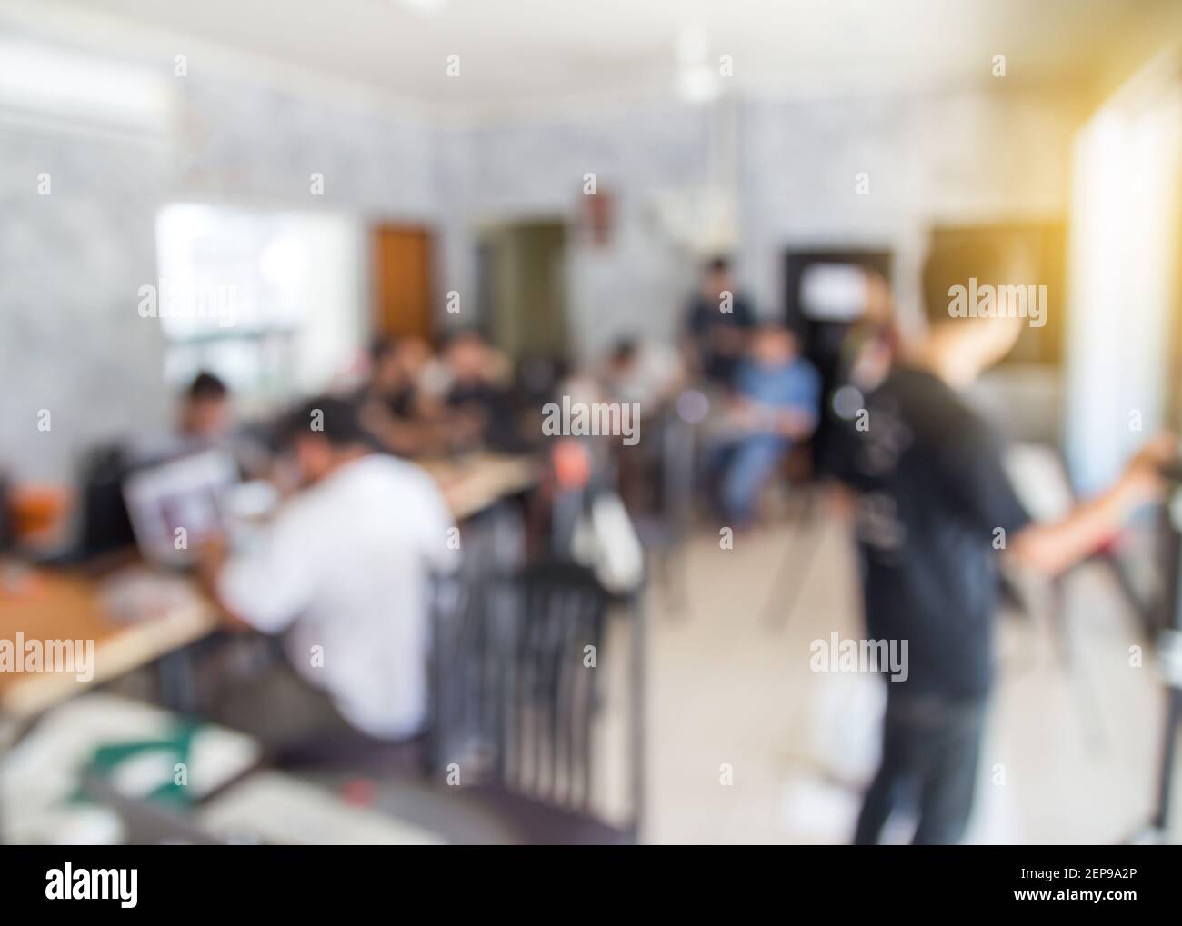 Blur abstract background of employees young colleagues sitting at the ...