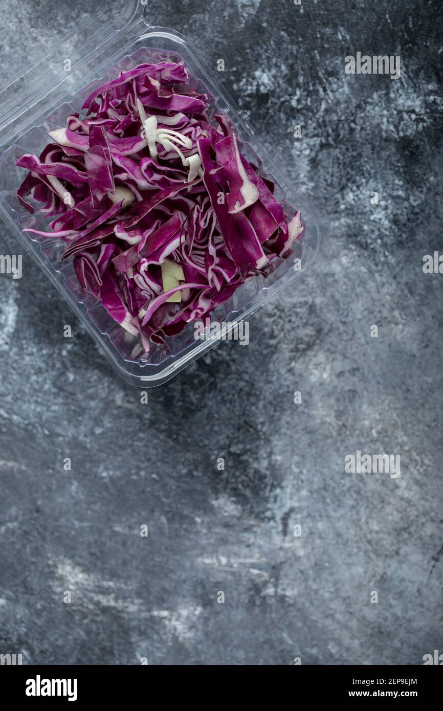 Vertical photo of chopped cabbage in plastic container Stock Photo - Alamy
