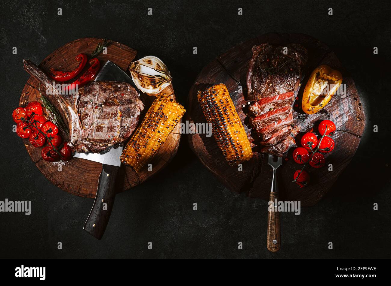 fresh grilled tomahawk steak with vegetables Stock Photo - Alamy
