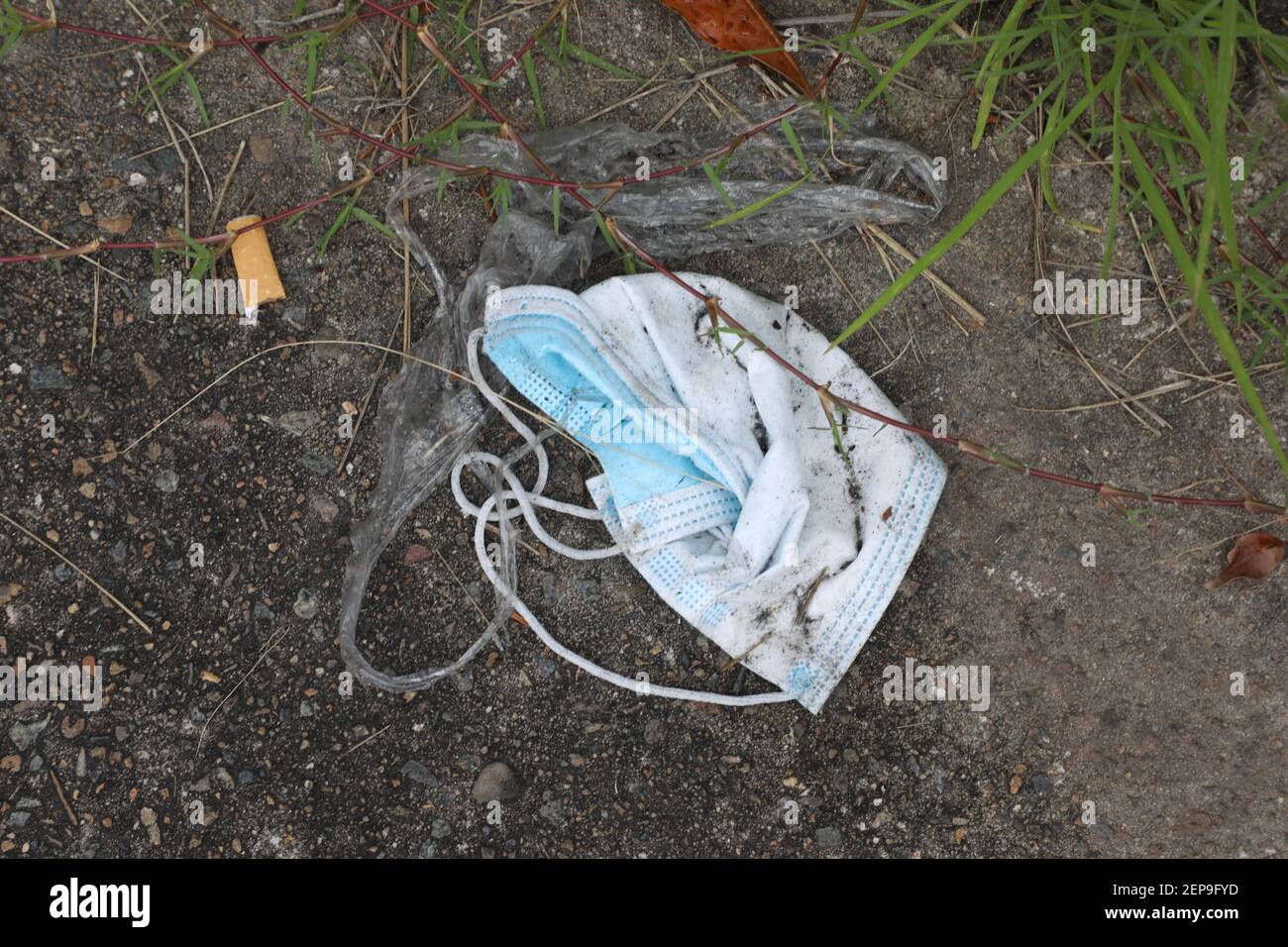 Littered face masks hi-res stock photography and images - Alamy