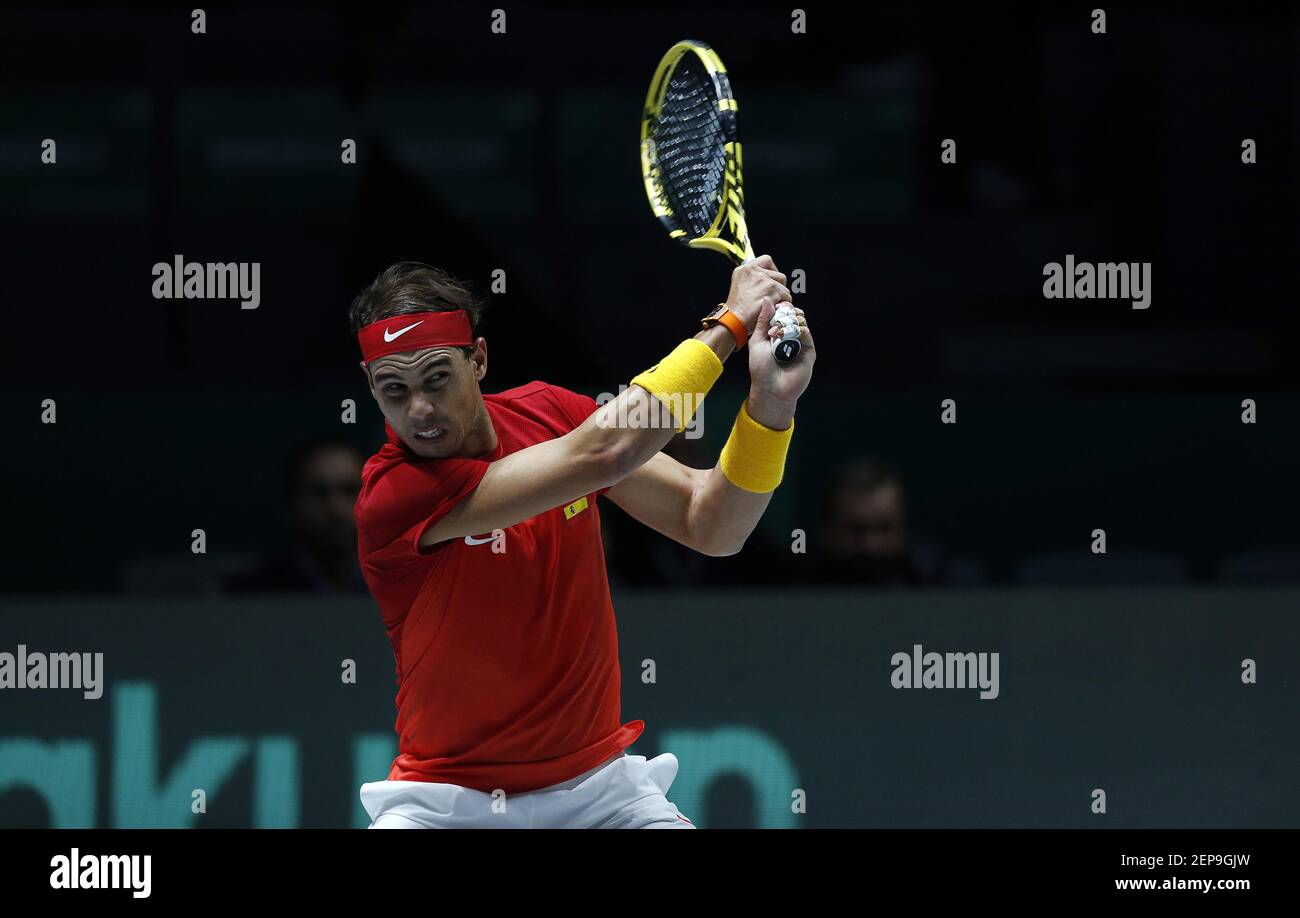 Rafael Nadal of Spain plays a backhand against Karen Khachanov of ...