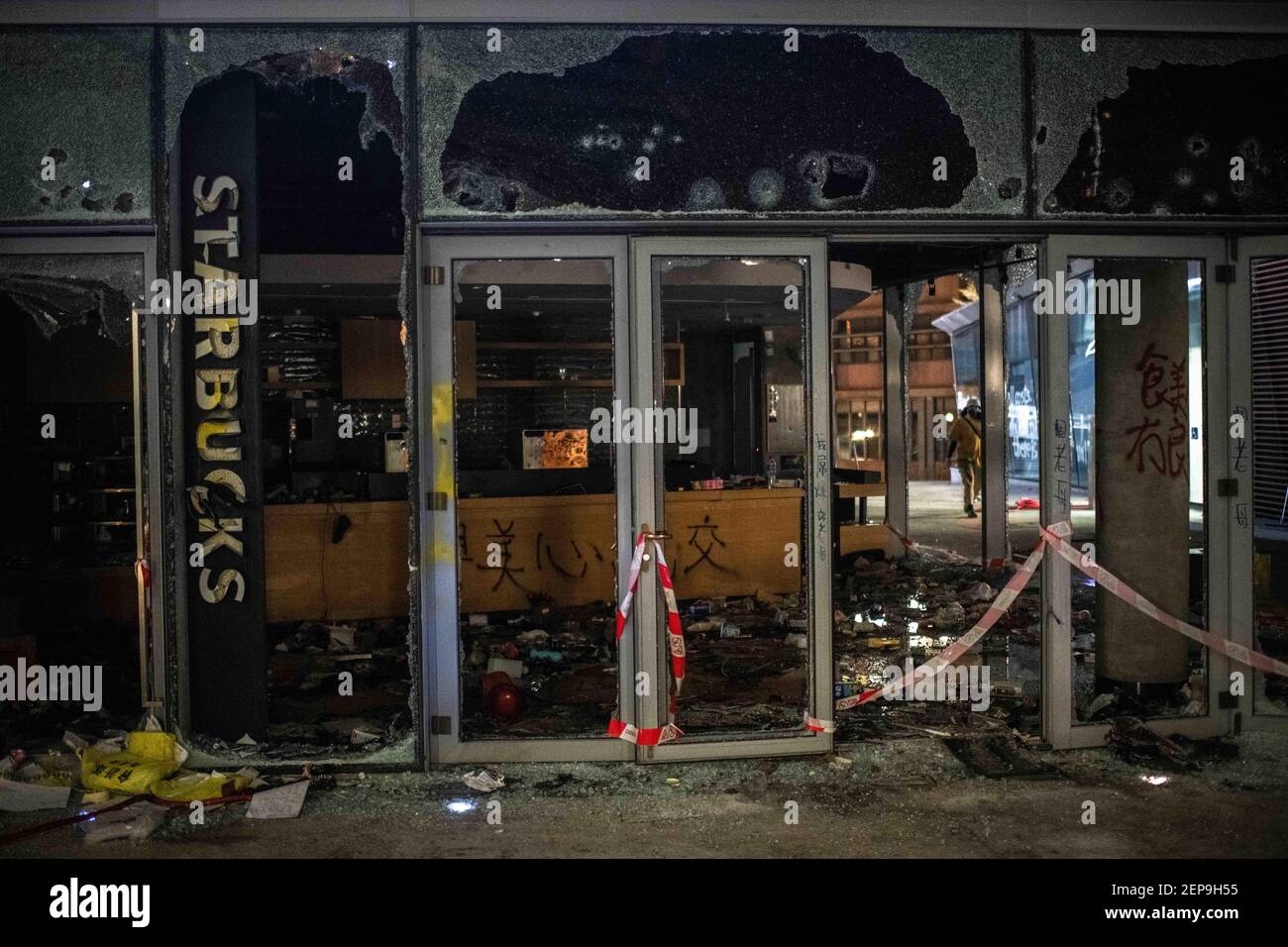 A Starbucks store at PolyU campus vandalised by protesters during the ...