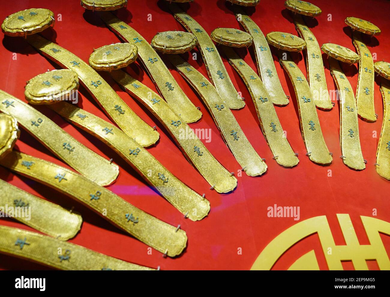 A gift for Qianlong Emperor's birthday, golden ruyi, is demonstrated at ...
