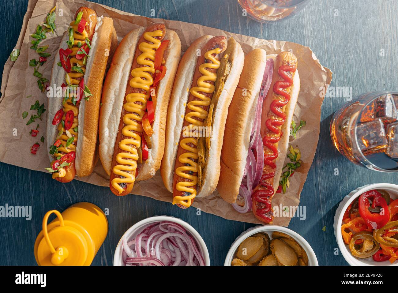 four fresh ready to eat american hot dogs Stock Photo - Alamy