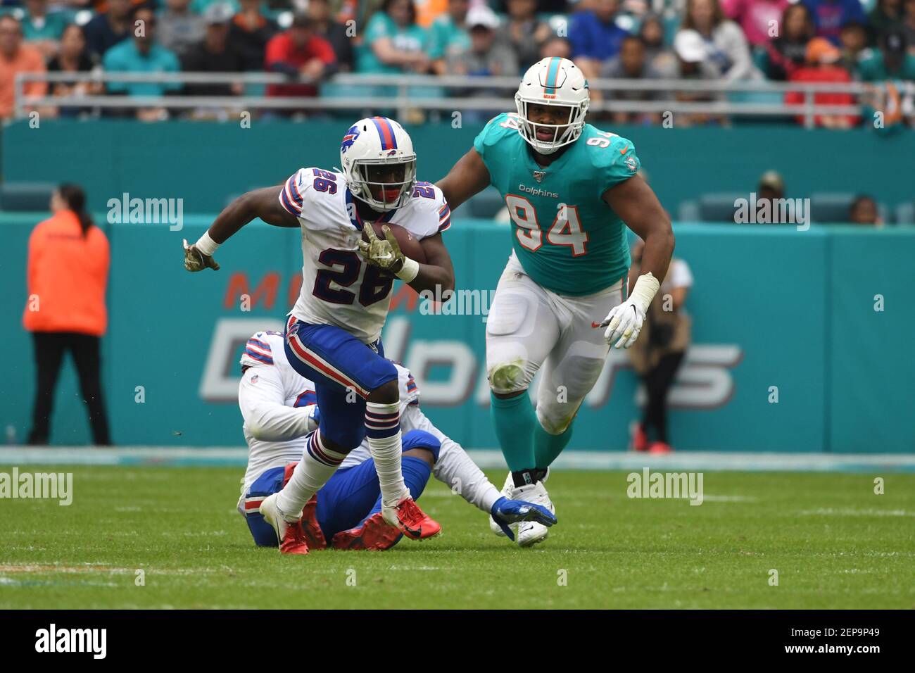 November 17, 2019: Devin Singletary #26 of Buffalo runs from Christian ...