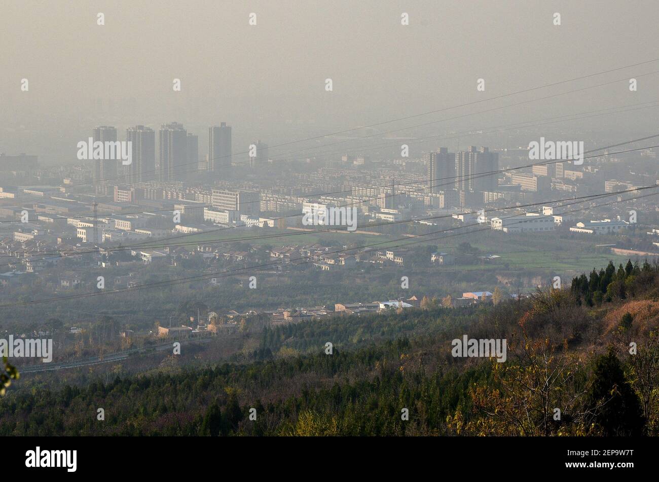 A distant view of the skyscrapers covered by heavy haze in downtown ...