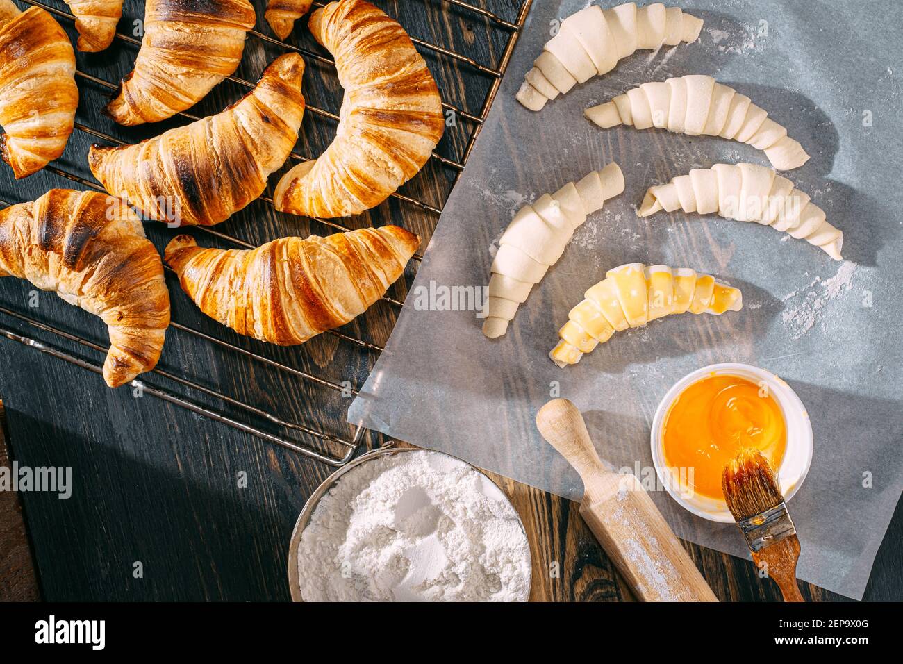 the chef cooks croissants in the kitchen in the morning, on the table ...