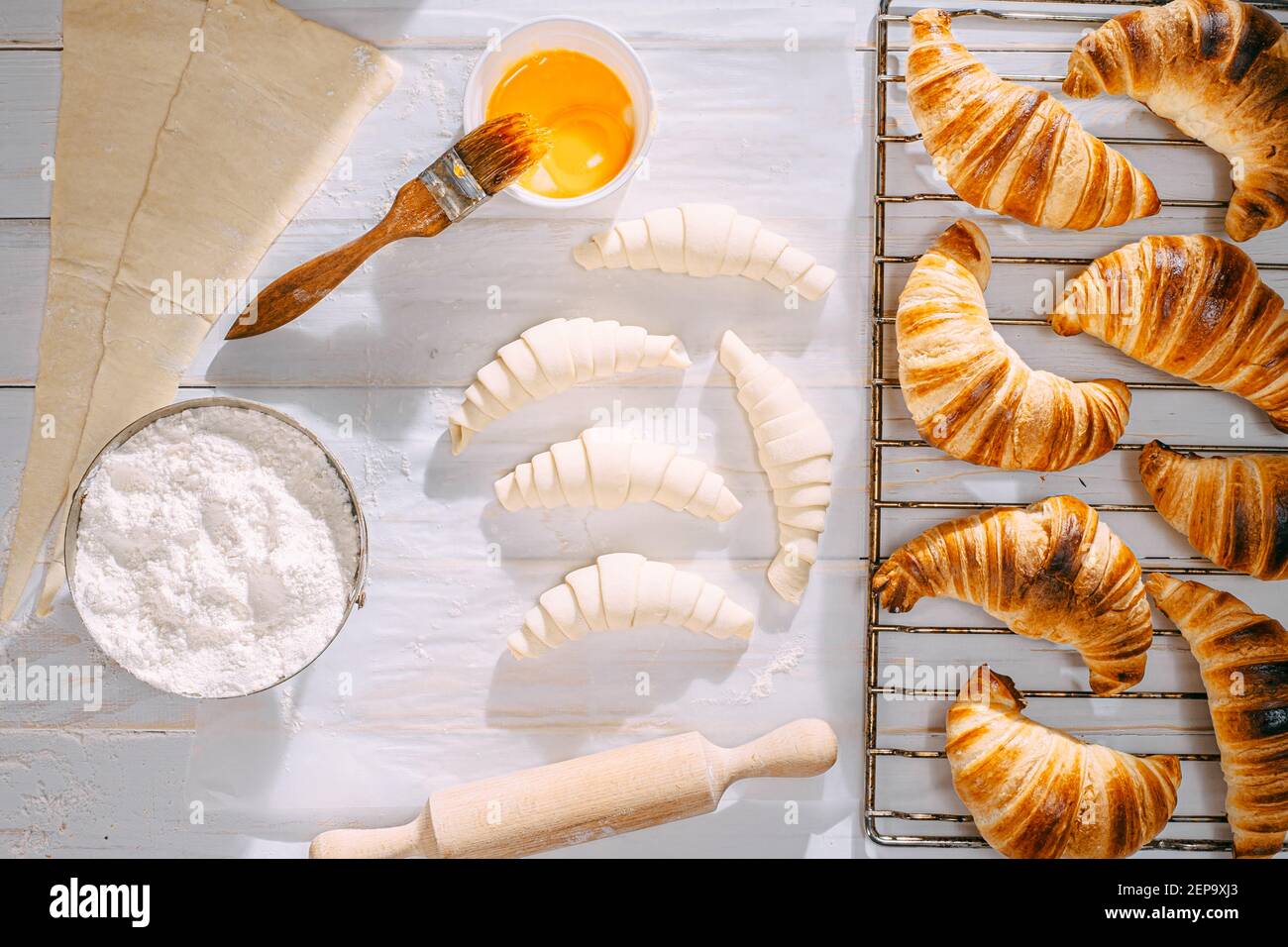 the chef cooks croissants in the kitchen in the morning, on the table ...
