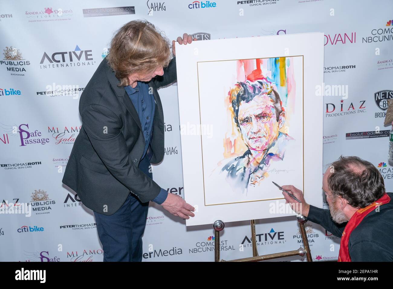John Carter Cash signs the Tony Capparelli painting of his father ...