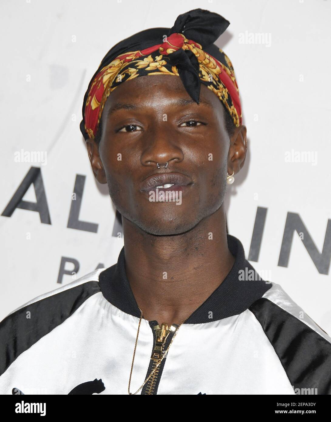Adonis Bosso arrives at the PUMA x Balmain Launch Event held at Milk ...