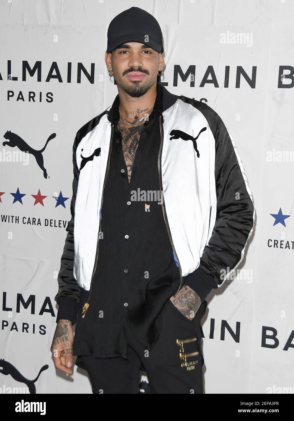 Miles Brockman Richie arrives at the PUMA x Balmain Launch Event held ...