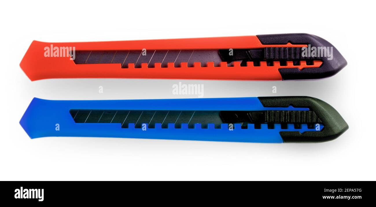 The blue and red paper cutters with closed blade, isolated on white ...