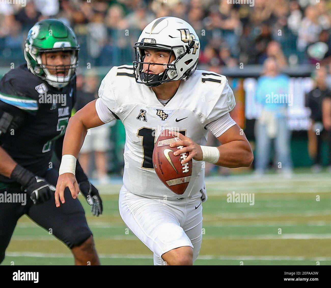 November 23, 2019: UCF QB Dillon Gabriel #11 looks for an open receiver ...