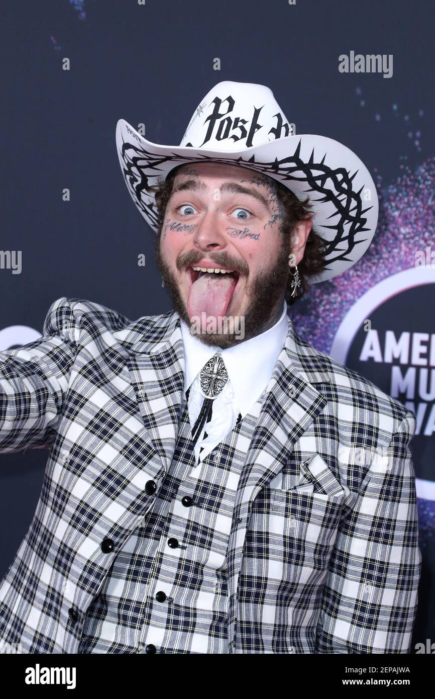LOS ANGELES, CALIFORNIA, USA - NOVEMBER 24: Rapper Post Malone arrives ...