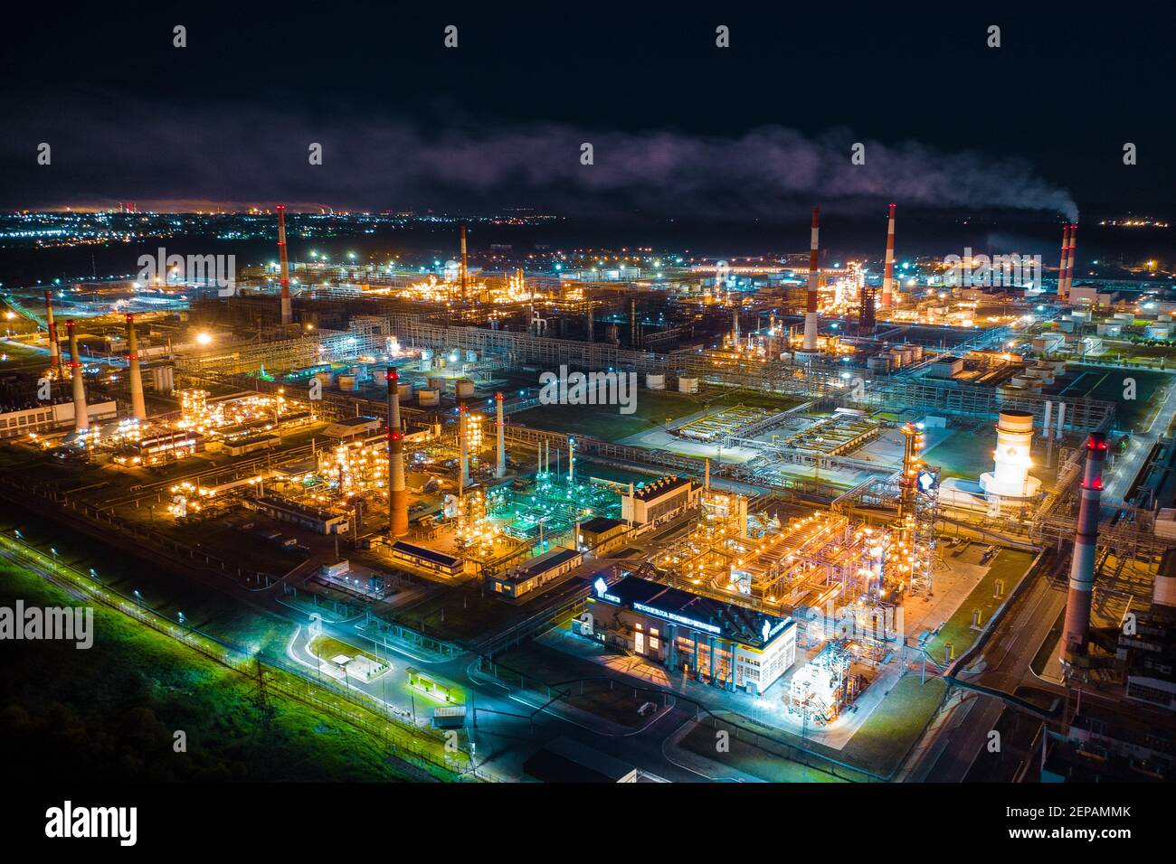 Chemical oil refinery factory night aerial view Stock Photo - Alamy
