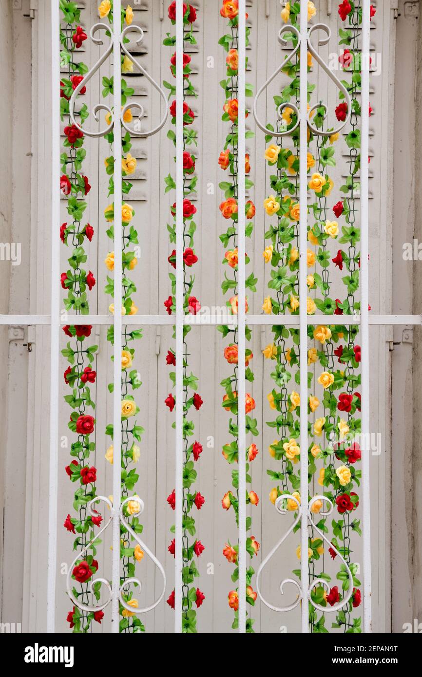 A window shutter decorated with flowers in Montmartre, Paris, France ...