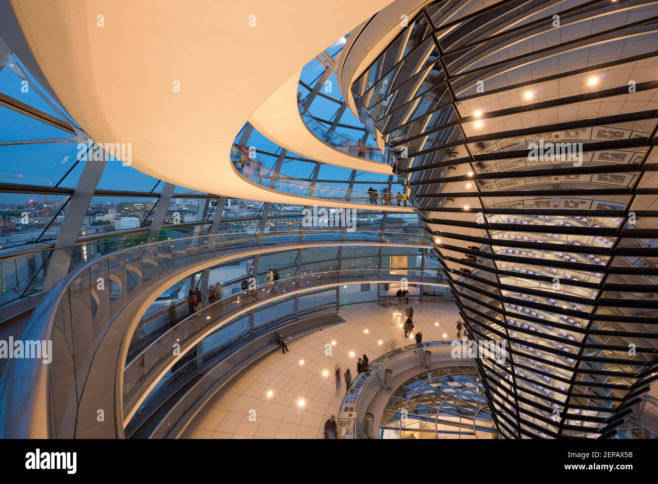 The spiral walkway inside the glass dome of the Reichstag building in ...