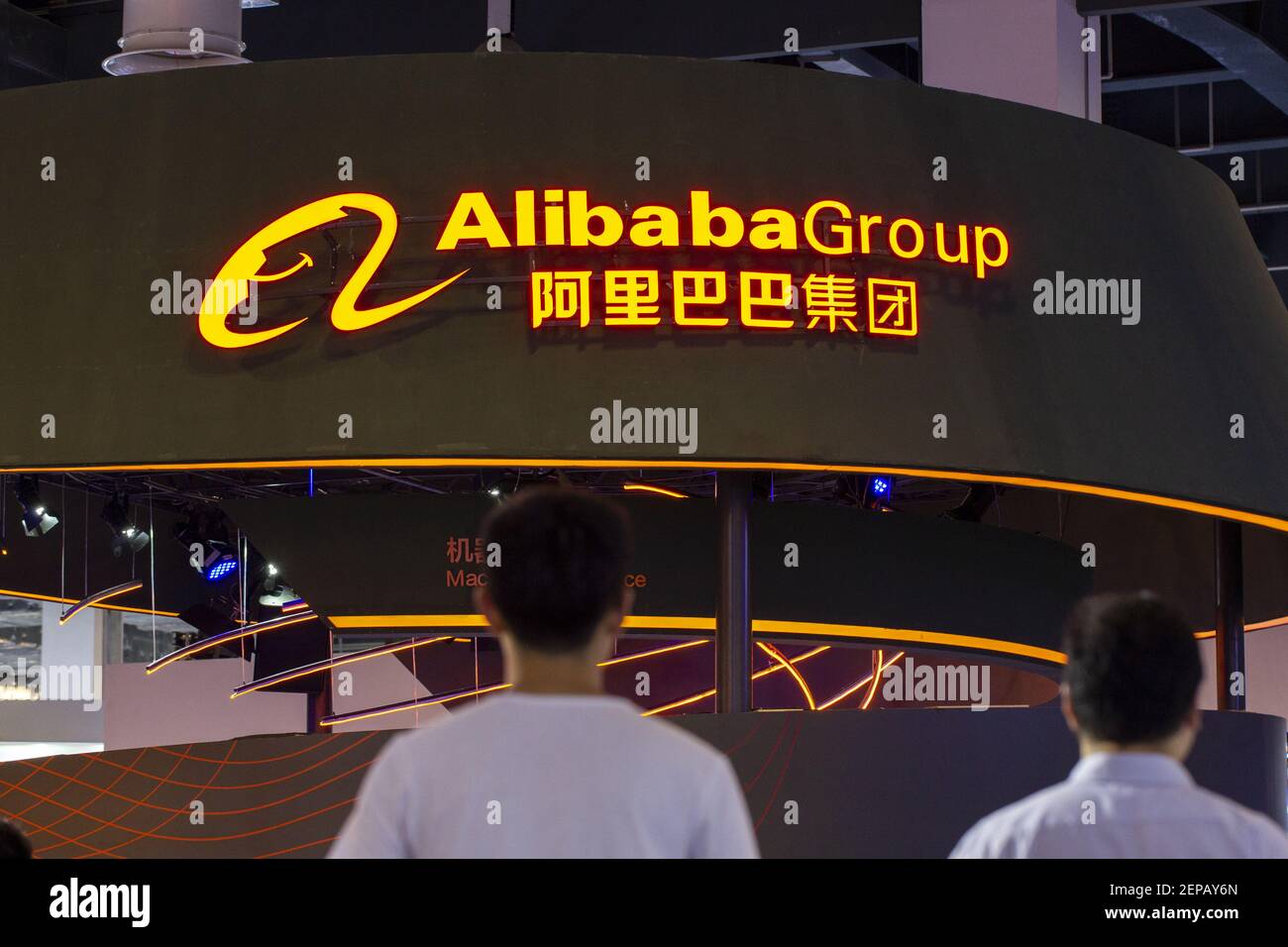 --File--People look at the Alibaba Group booth at the 2019 World ...