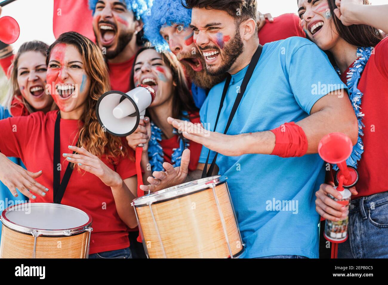 Crazy sport fans screaming while supporting their team out of the ...