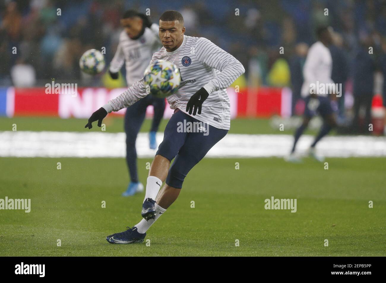 Kylian Mbappe of PSG warms up before UEFA Champions League match ...