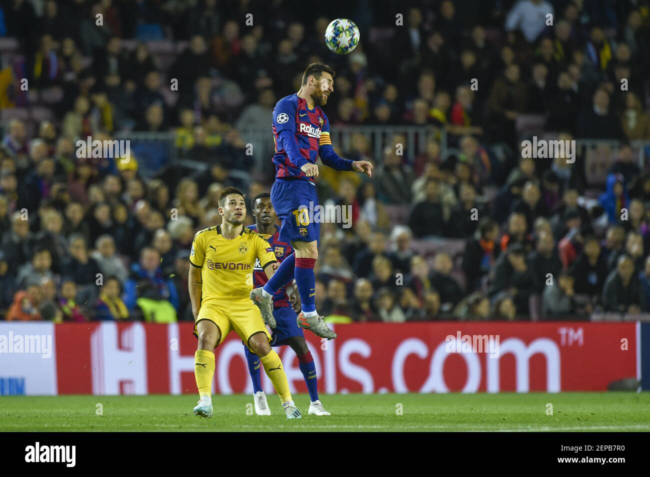 Lionel Messi of Barcelona jumps high for the ball during the UEFA ...