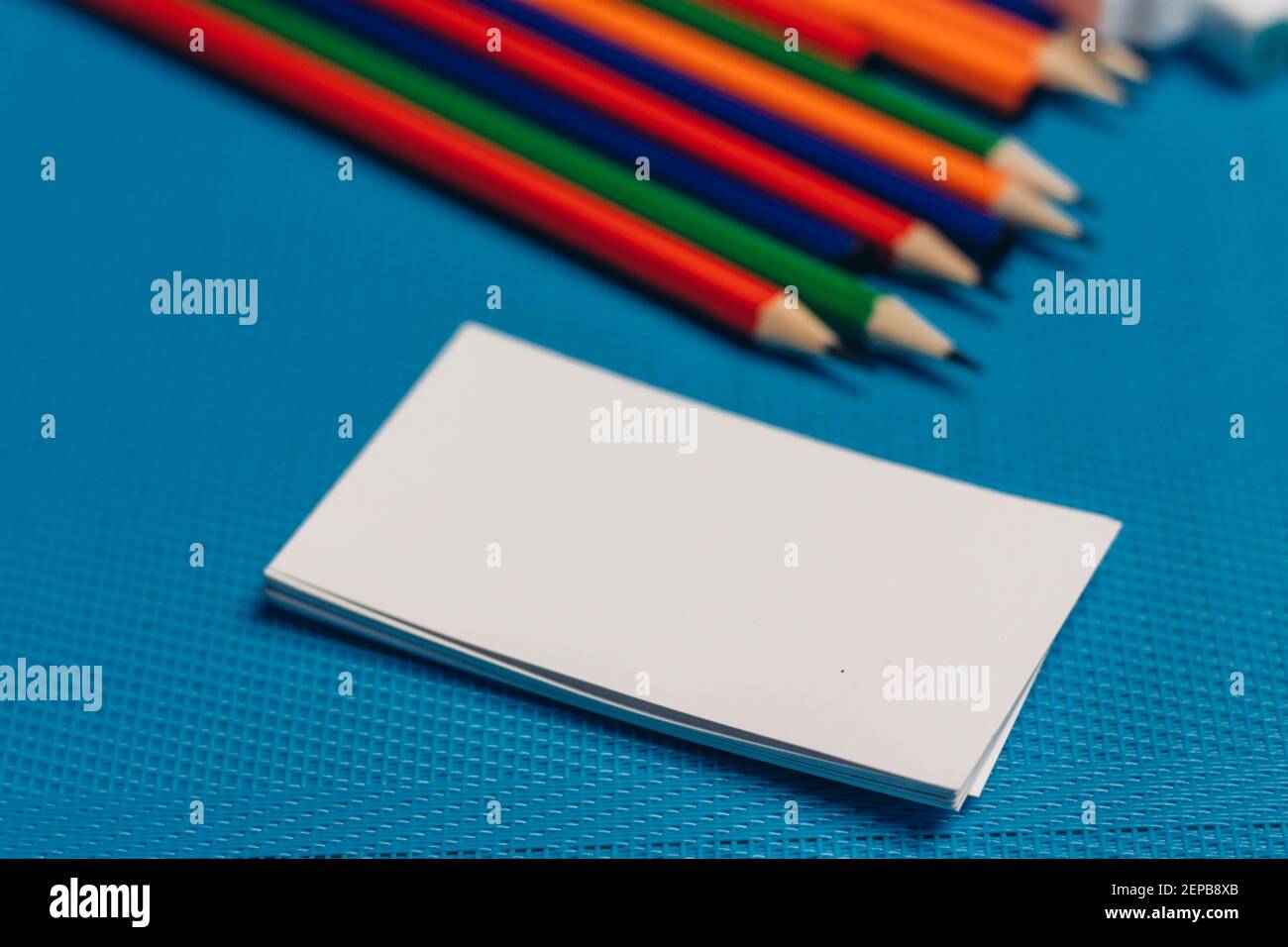colored pencils business cards blue background Copy Space Stock Photo ...