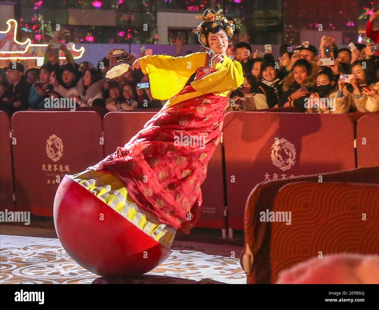 The "Roly-poly Woman" dances with elegance while interacting with ...