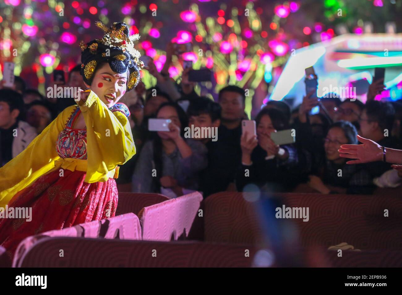 The "Roly-poly Woman" dances with elegance while interacting with ...