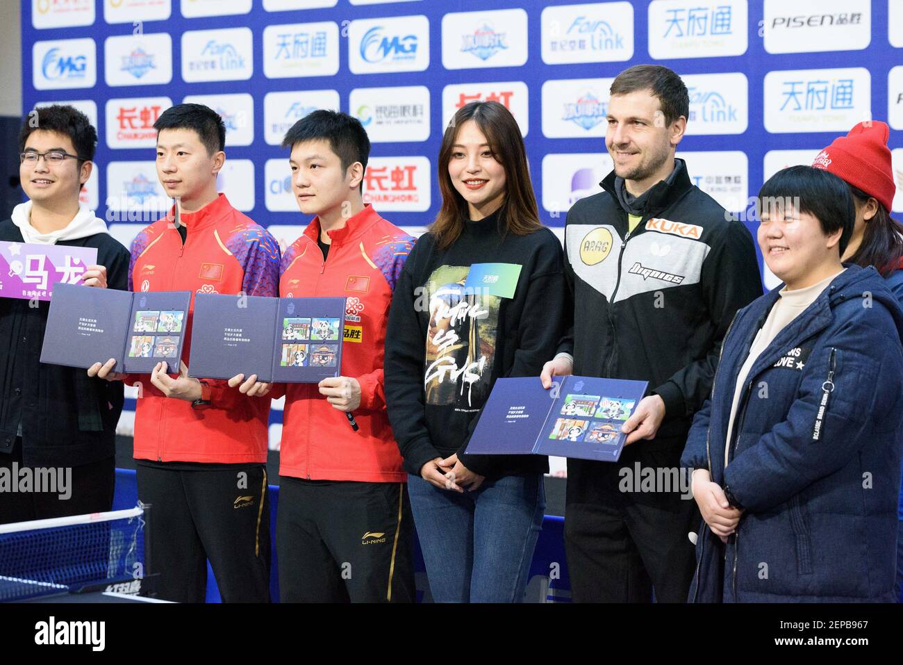 Chengdu, CHINA-Chinese table tennis players Ma long, Fan Zhendong and ...