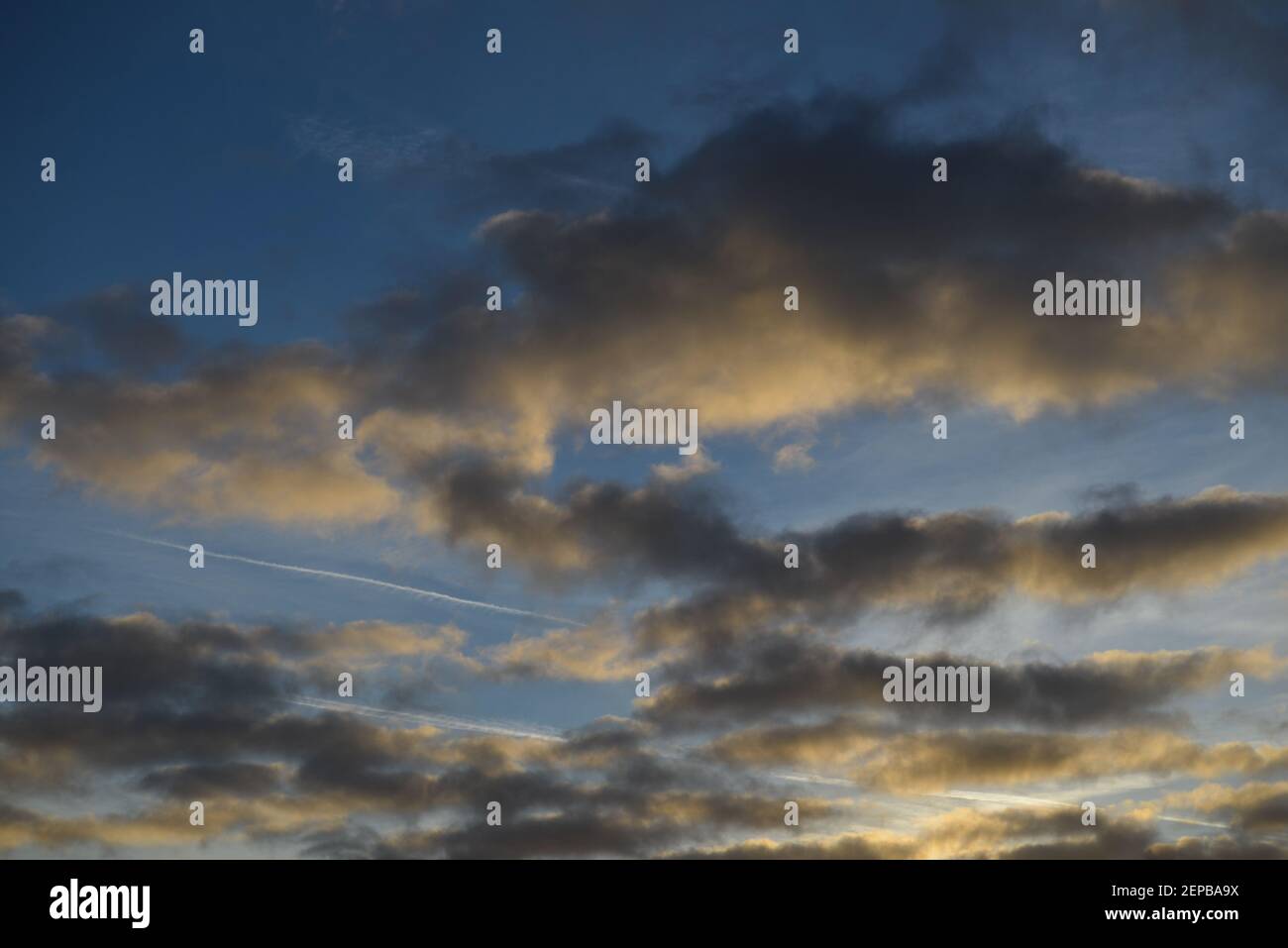 Background sky texture with cumulus clouds at sunrise Stock Photo - Alamy