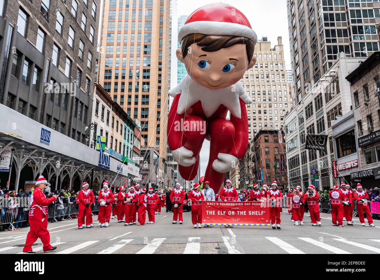 The Elf On A Shelf floats along 6th Avenue in the Macy's Thanksgiving ...